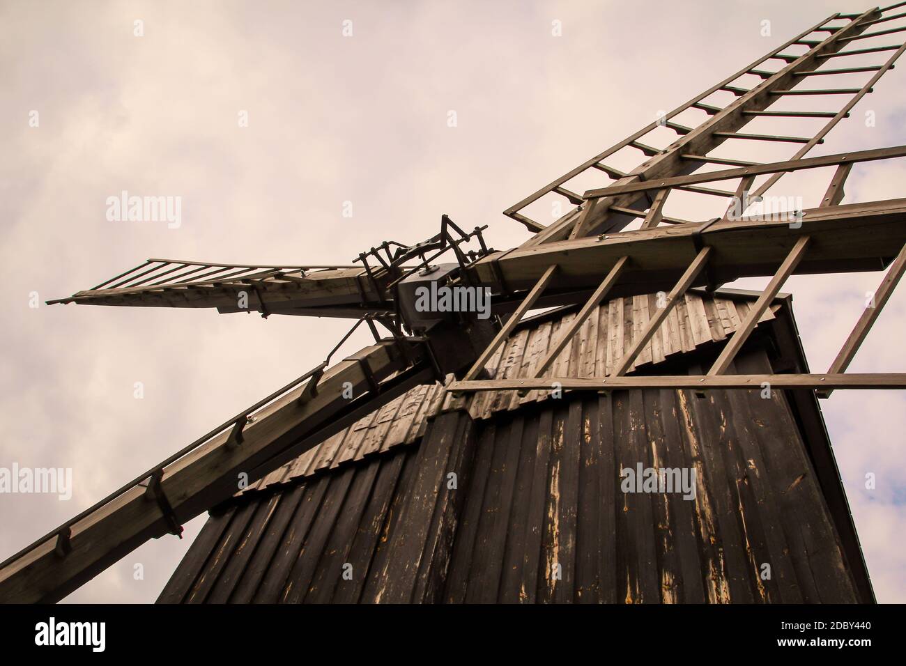 View, details of a well-preserved old post mill Stock Photo - Alamy