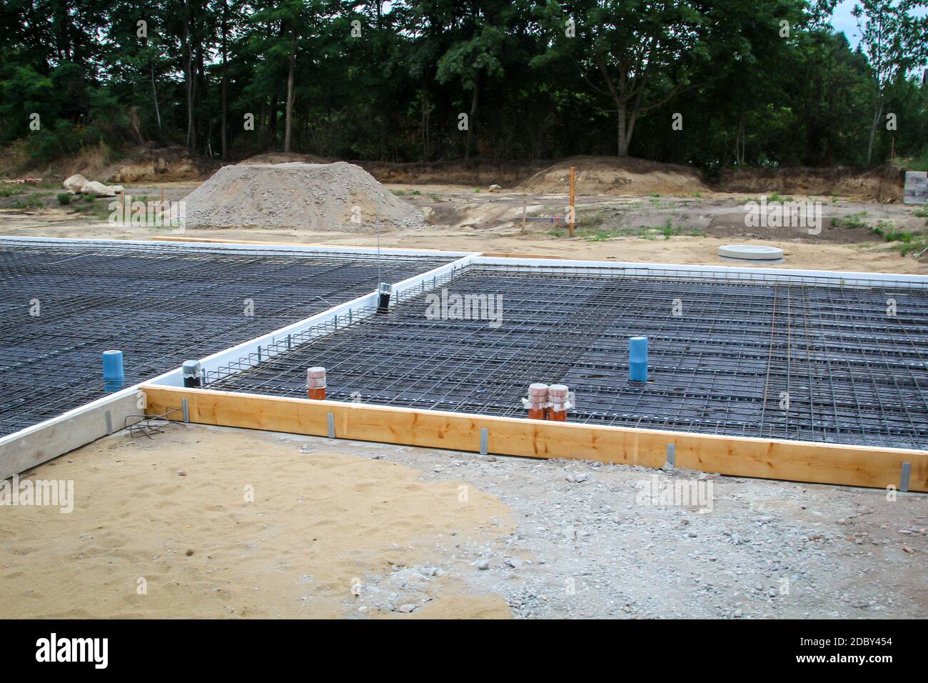 A base plate with steel reinforcement prepared for pouring. The first ...