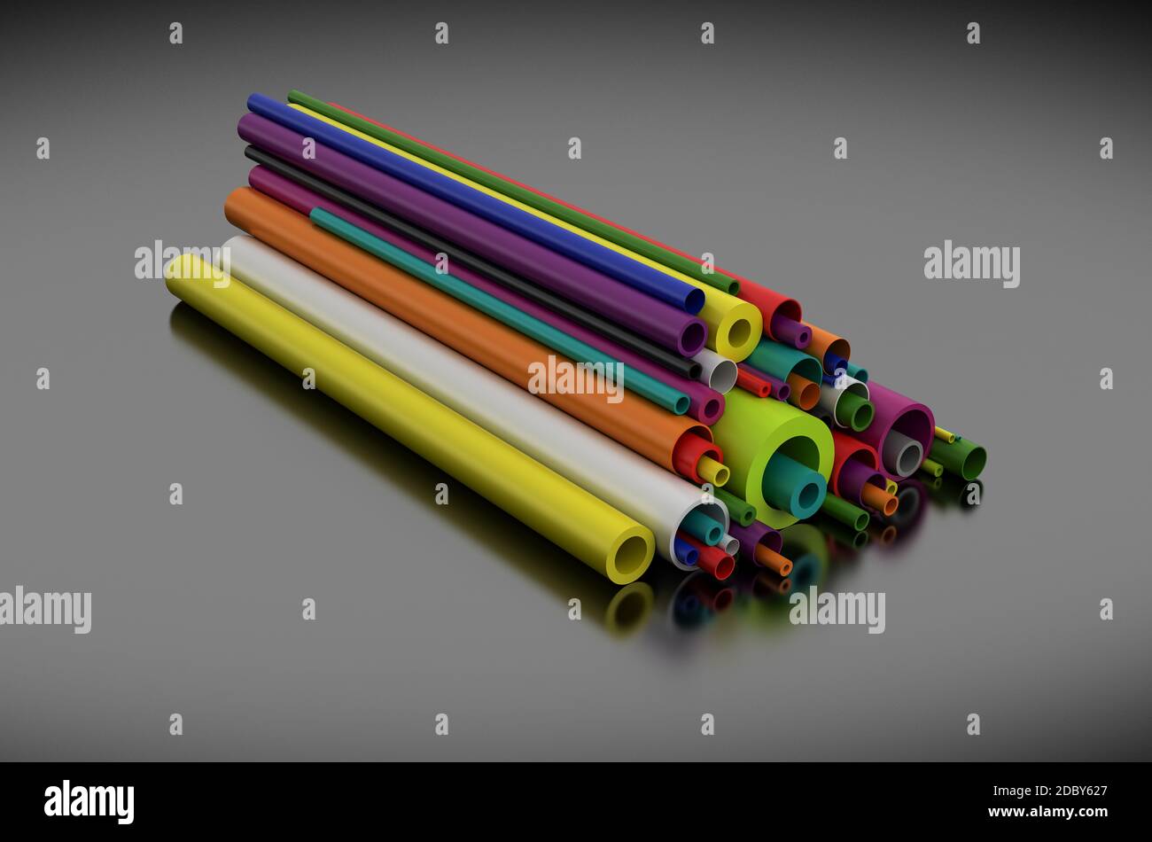 Colorful Plastic pipes on dark background Stock Photo - Alamy