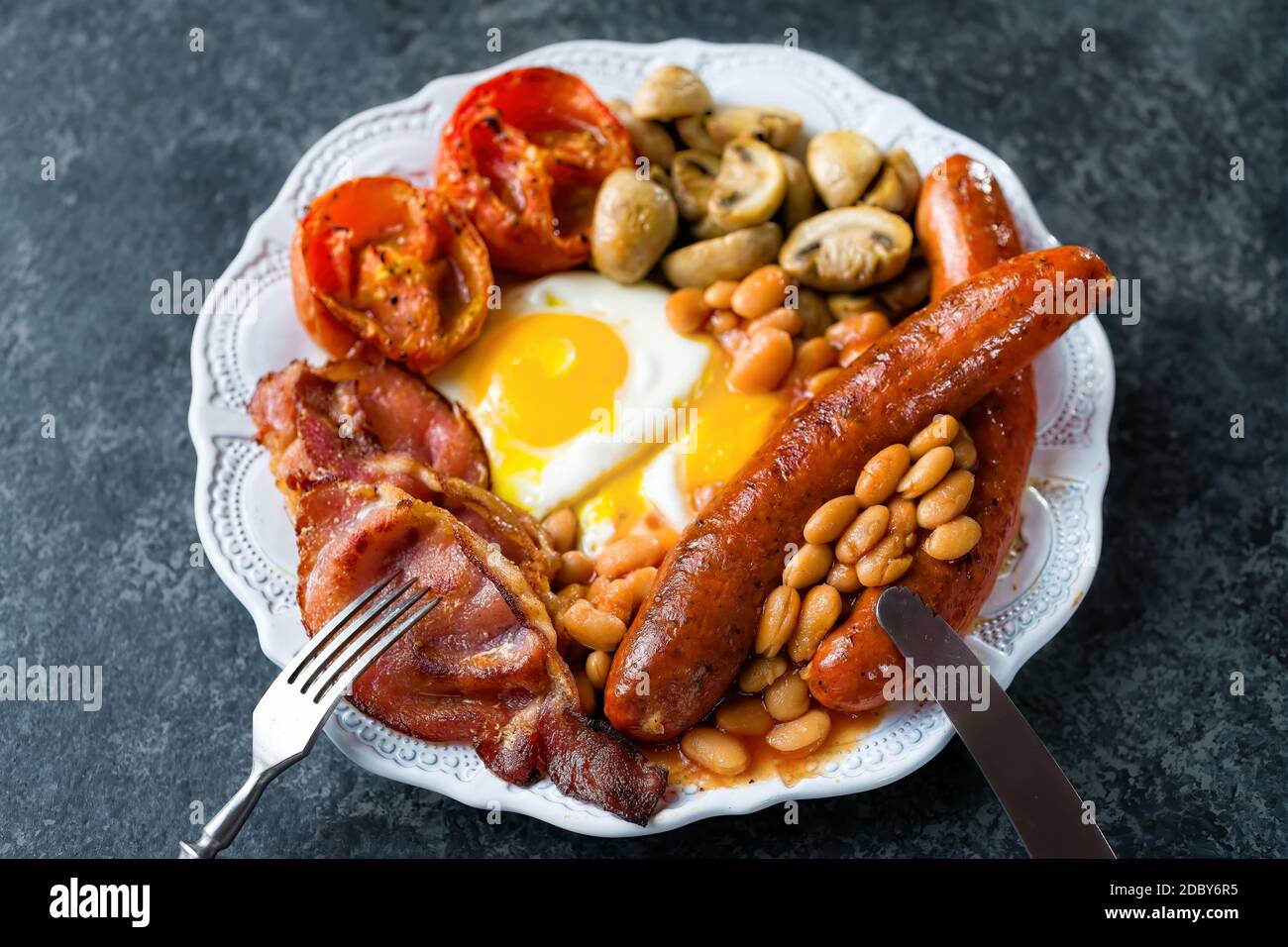 close up of plate of rustic full english breakfast Stock Photo - Alamy