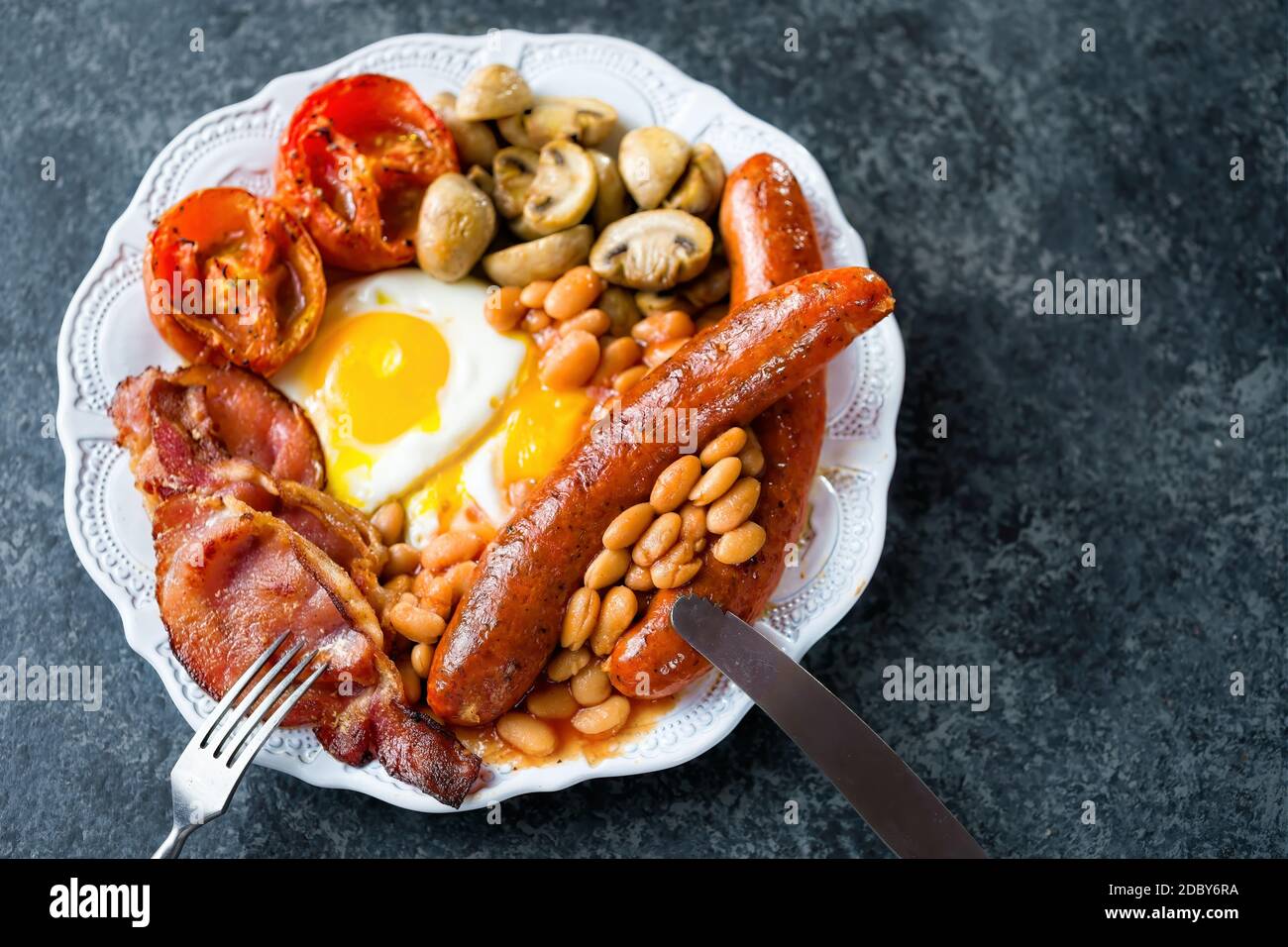 close up of plate of rustic full english breakfast Stock Photo - Alamy