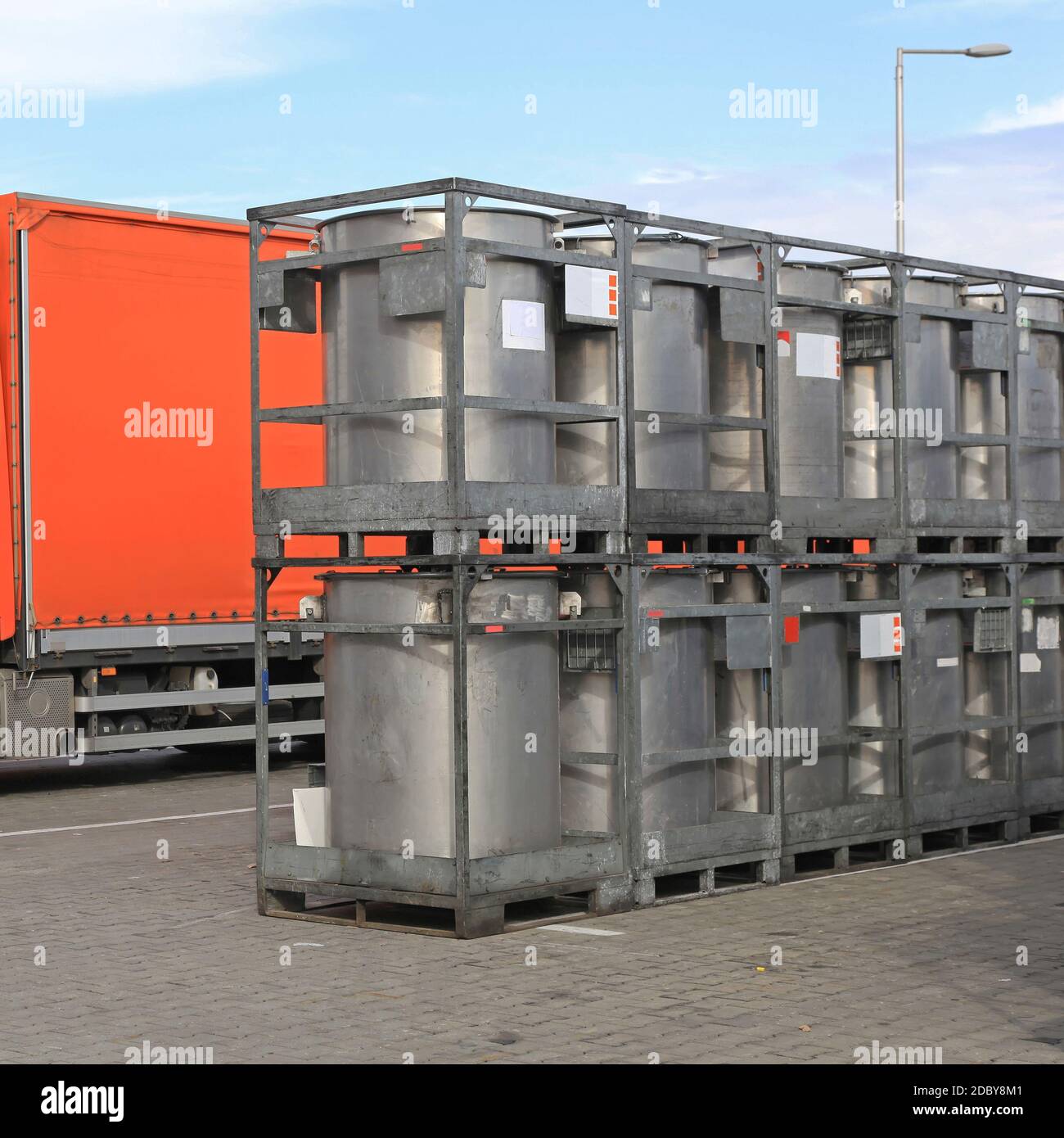 Metal Containers for Goods in Bulk Transport at Pallets Stock Photo - Alamy