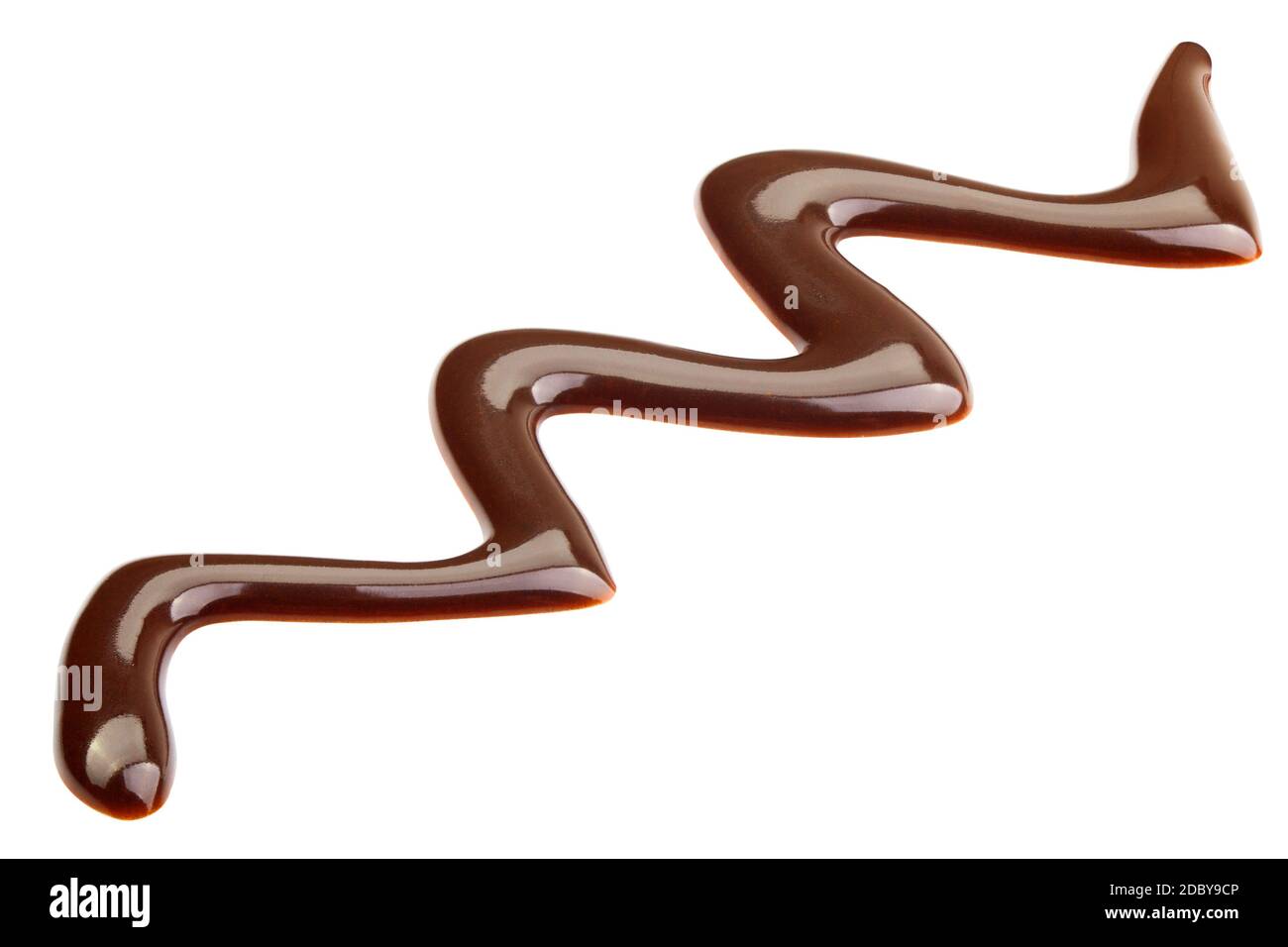 Liquid chocolate syrup isolated on white background, clipping path ...