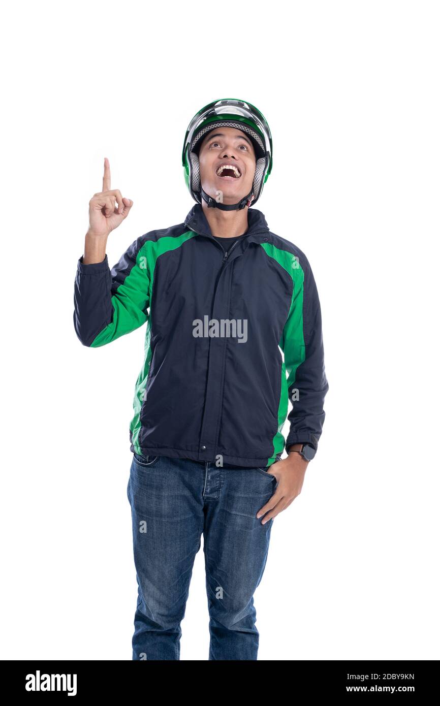 uber taxi driver with helmet pointing to blank white copy space Stock ...