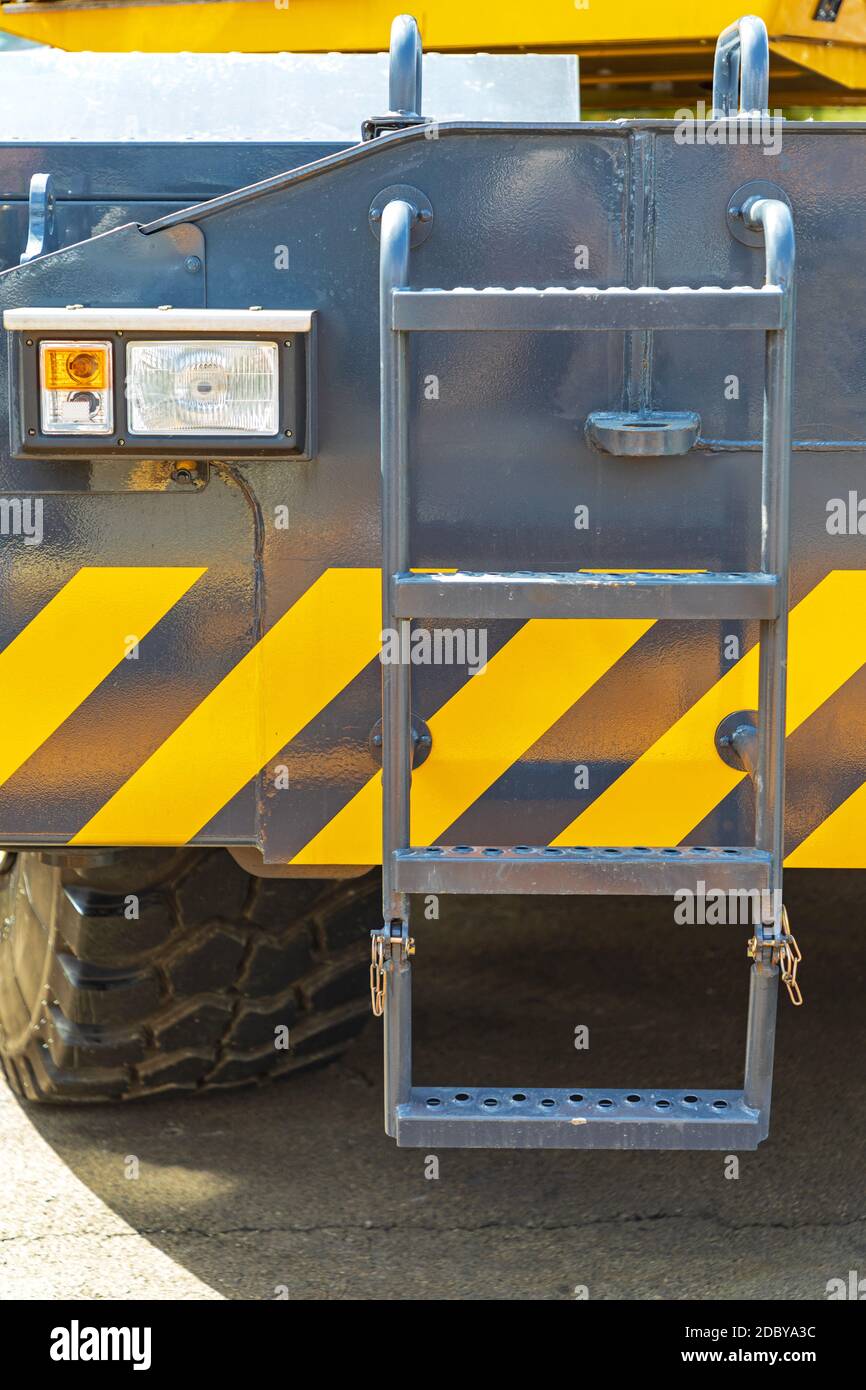 Ladder at Big Construction Machine Vehicle Stock Photo - Alamy