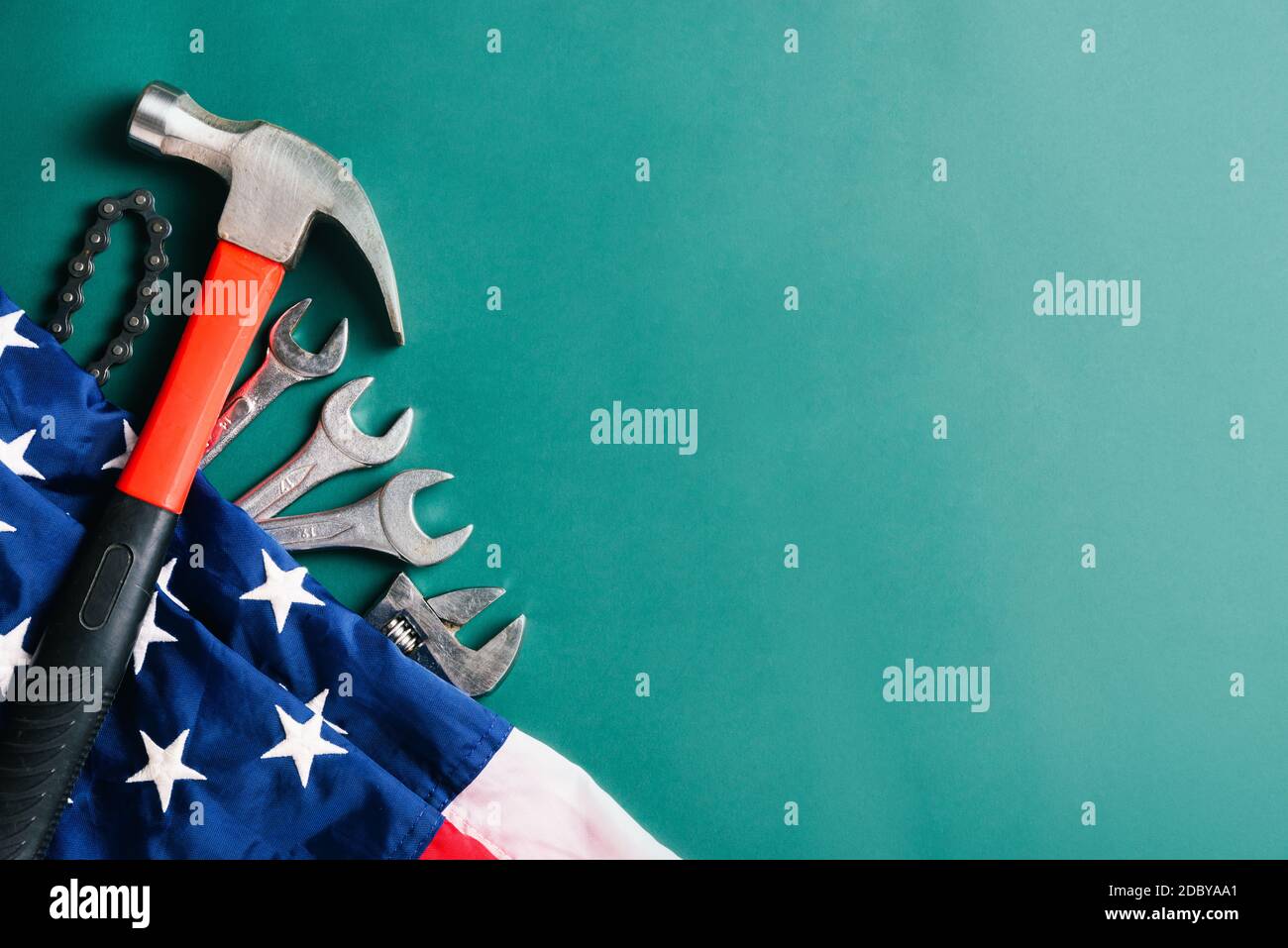 Labor day concept, Different kinds wrenches with American flag on dark ...