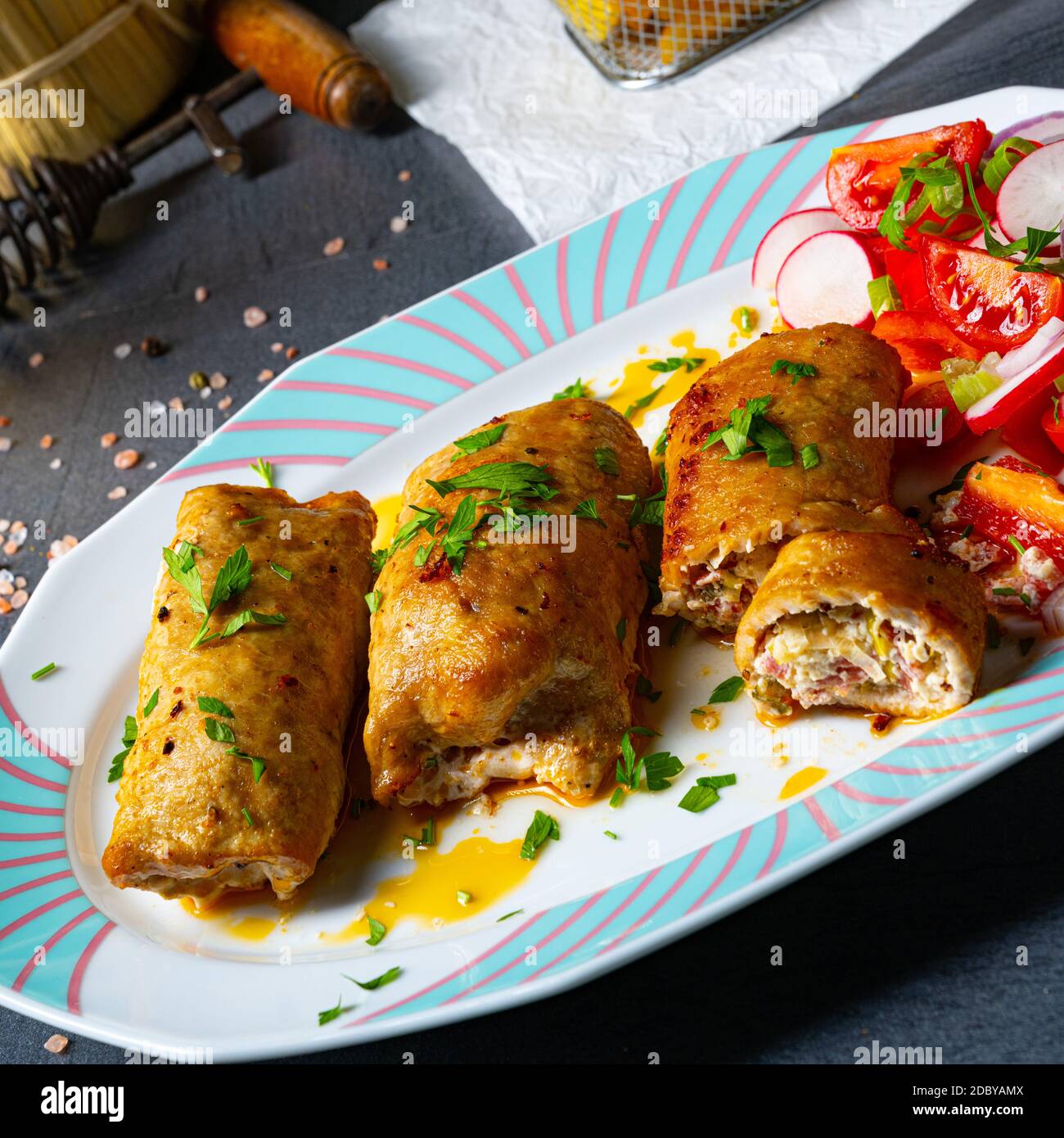 Vegetable roulade from roast pork loins with salads Stock Photo - Alamy