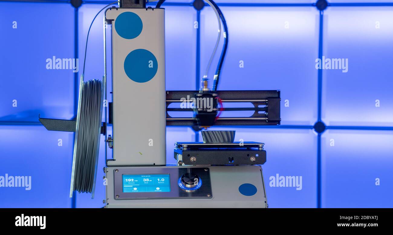 3D printer at work with printer 3D model High quality photo Stock Photo ...