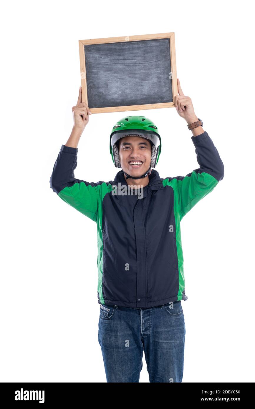 uber driver or commercial motorbike taxi rider holding blank board and ...