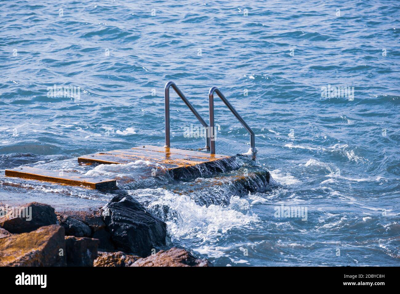 Beach And Sea In Bright Sunlight Stock Photo - Alamy