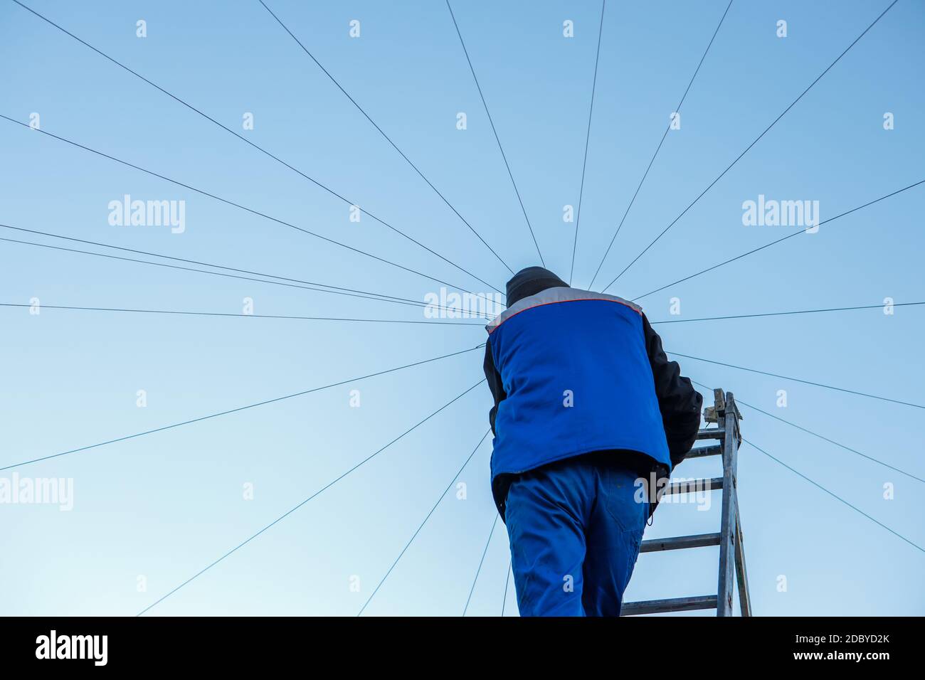 Man working on electrical wire hi-res stock photography and images - Alamy