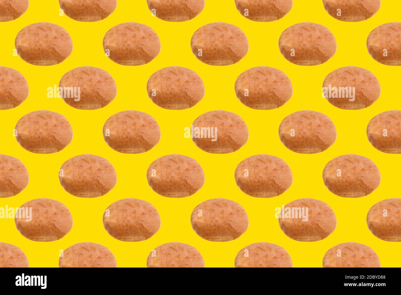 A loaf of white bread on a yellow isolated background. Seamless pattern ...