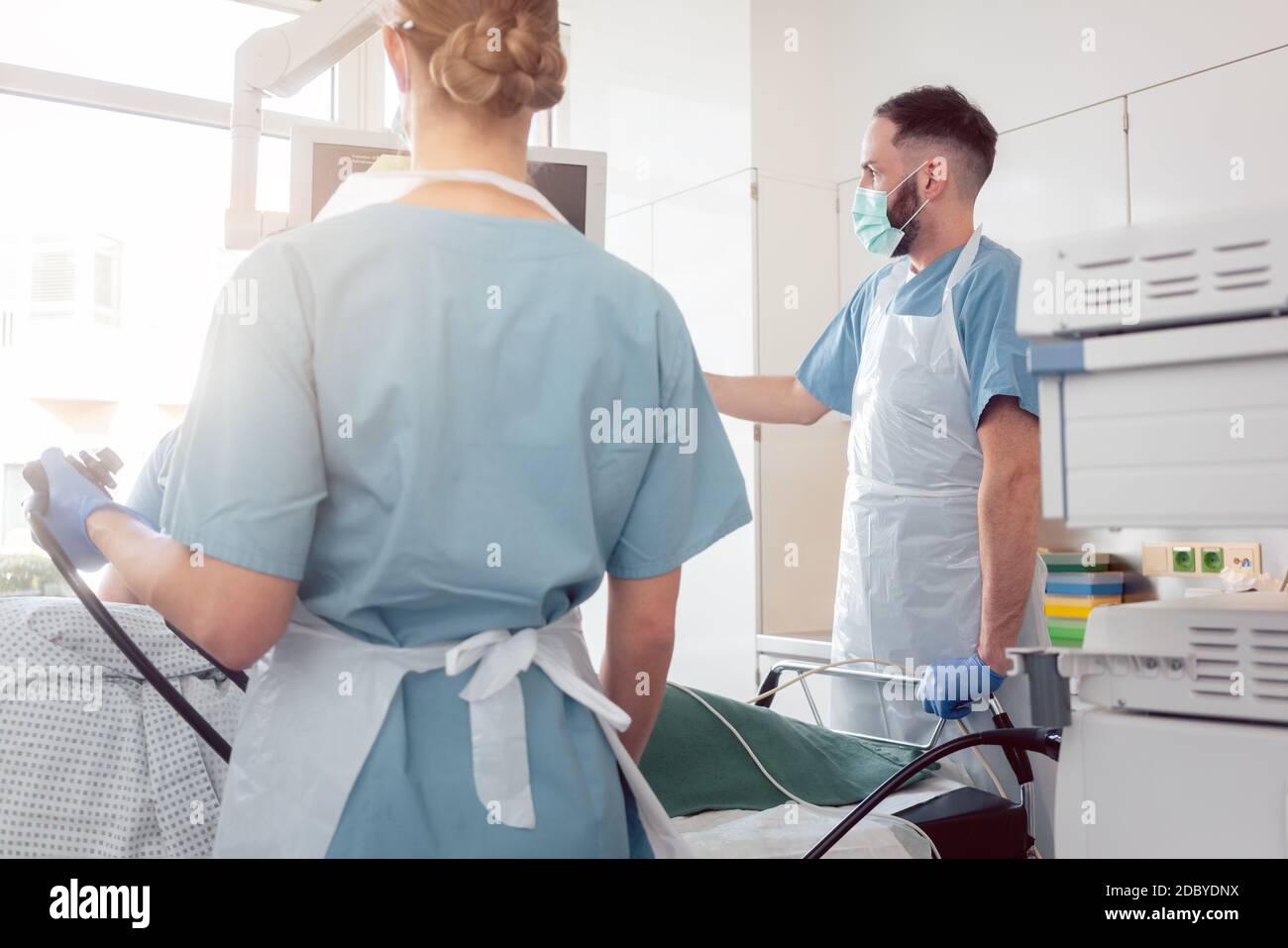 doctors in internal department of hospital performing endoscopy in ...