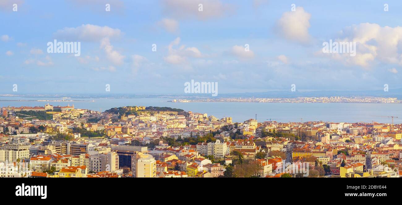 Panoramic aerial view of Lisbon at sunset with Lisbon Castle on top of ...
