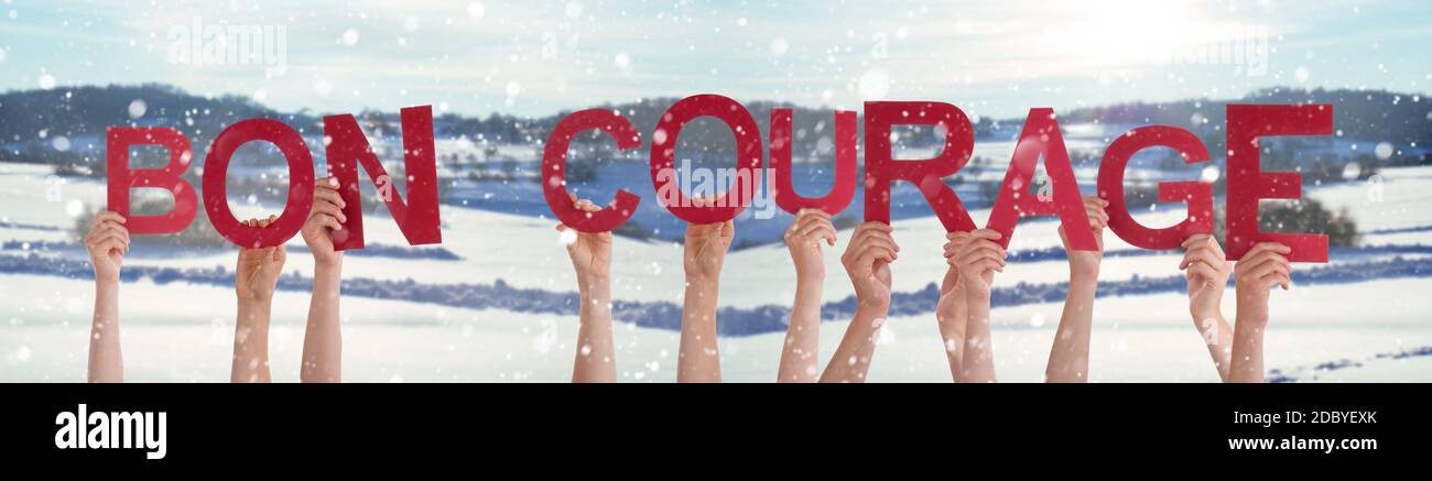 People Hands Holding Colorful French Word Bon Courage Means You Can Do ...
