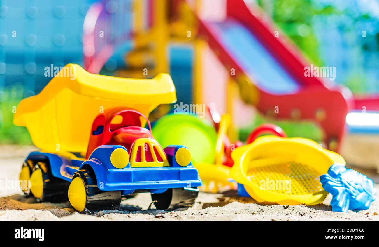 Colorful plastic children toys on the playground Stock Photo - Alamy