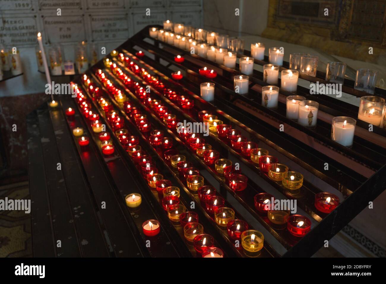 Votive candle rack hi-res stock photography and images - Alamy