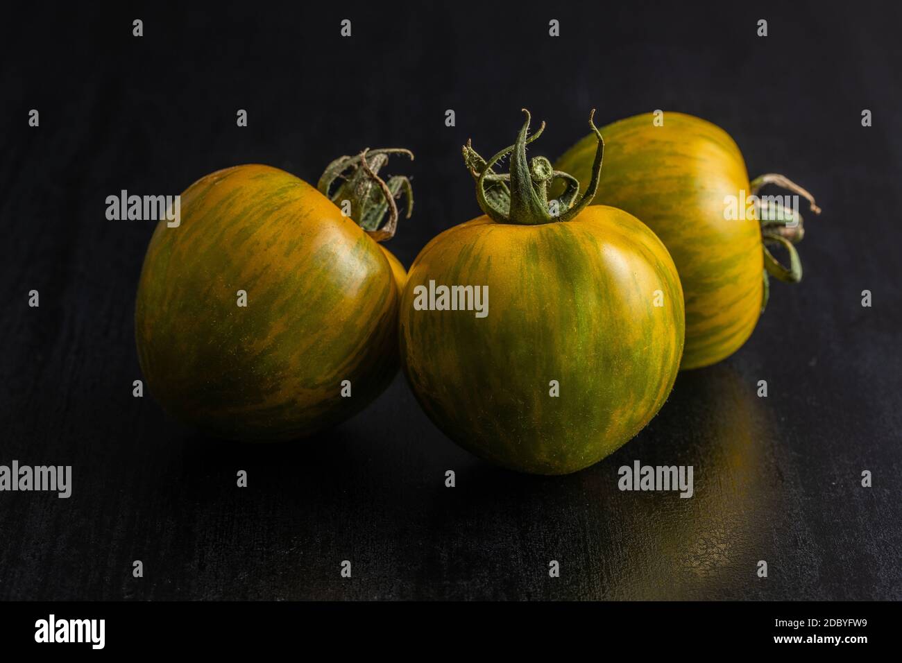 Green zebra tomato plant hi-res stock photography and images - Alamy
