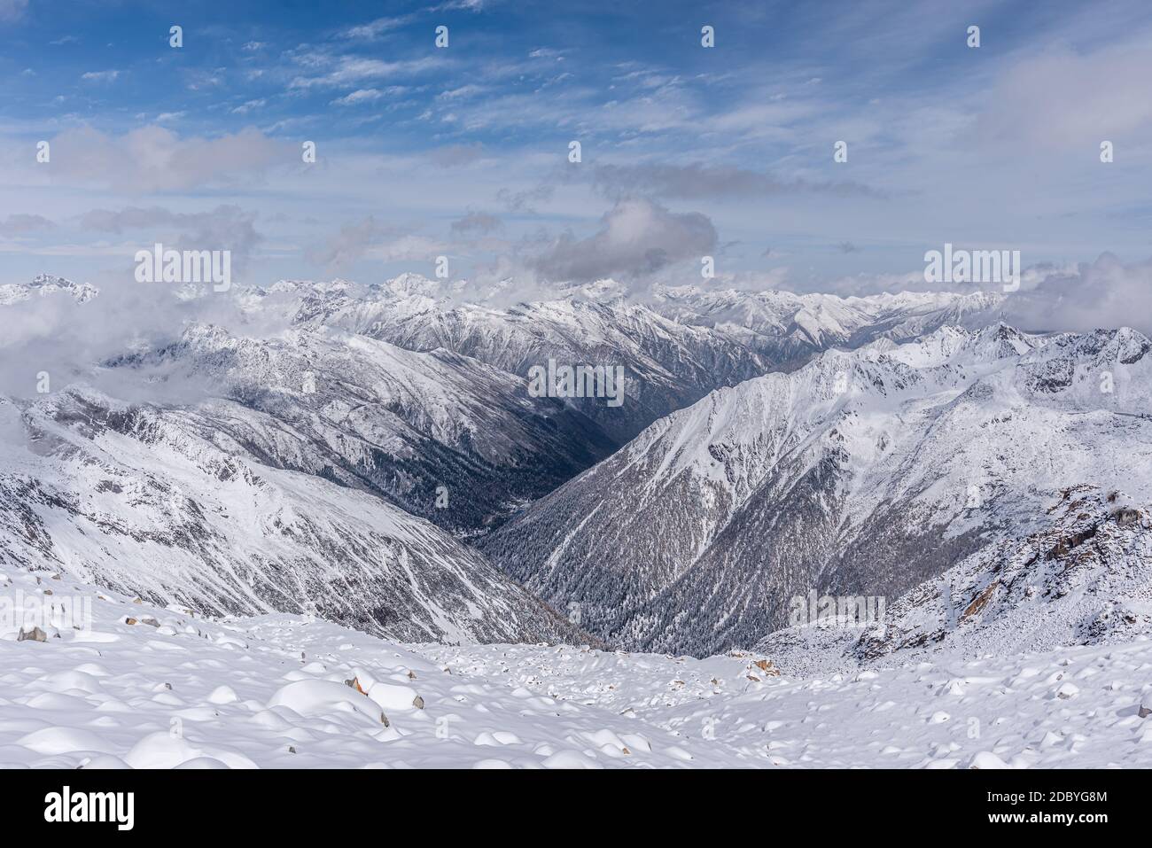 Aerial view of snow covered mountain range Stock Photo - Alamy