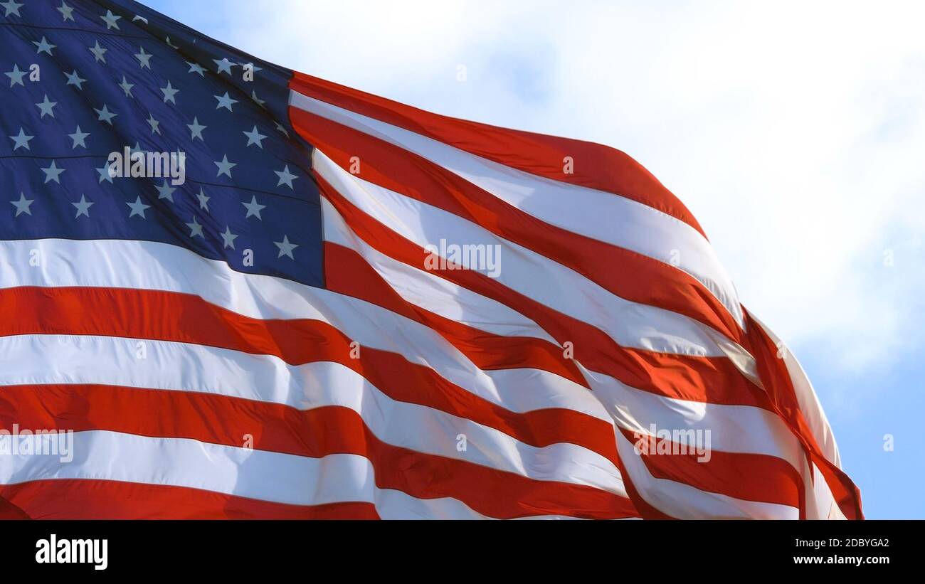 American flag waving proudly in the wind, representing. United States ...