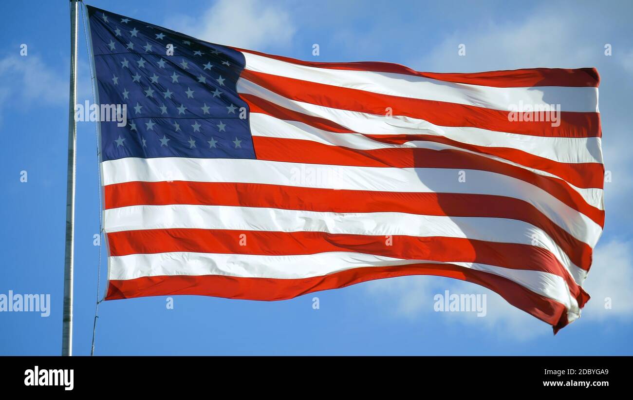 USA flag flaping in wind. Elegant Nylon American Flag Waving in the ...