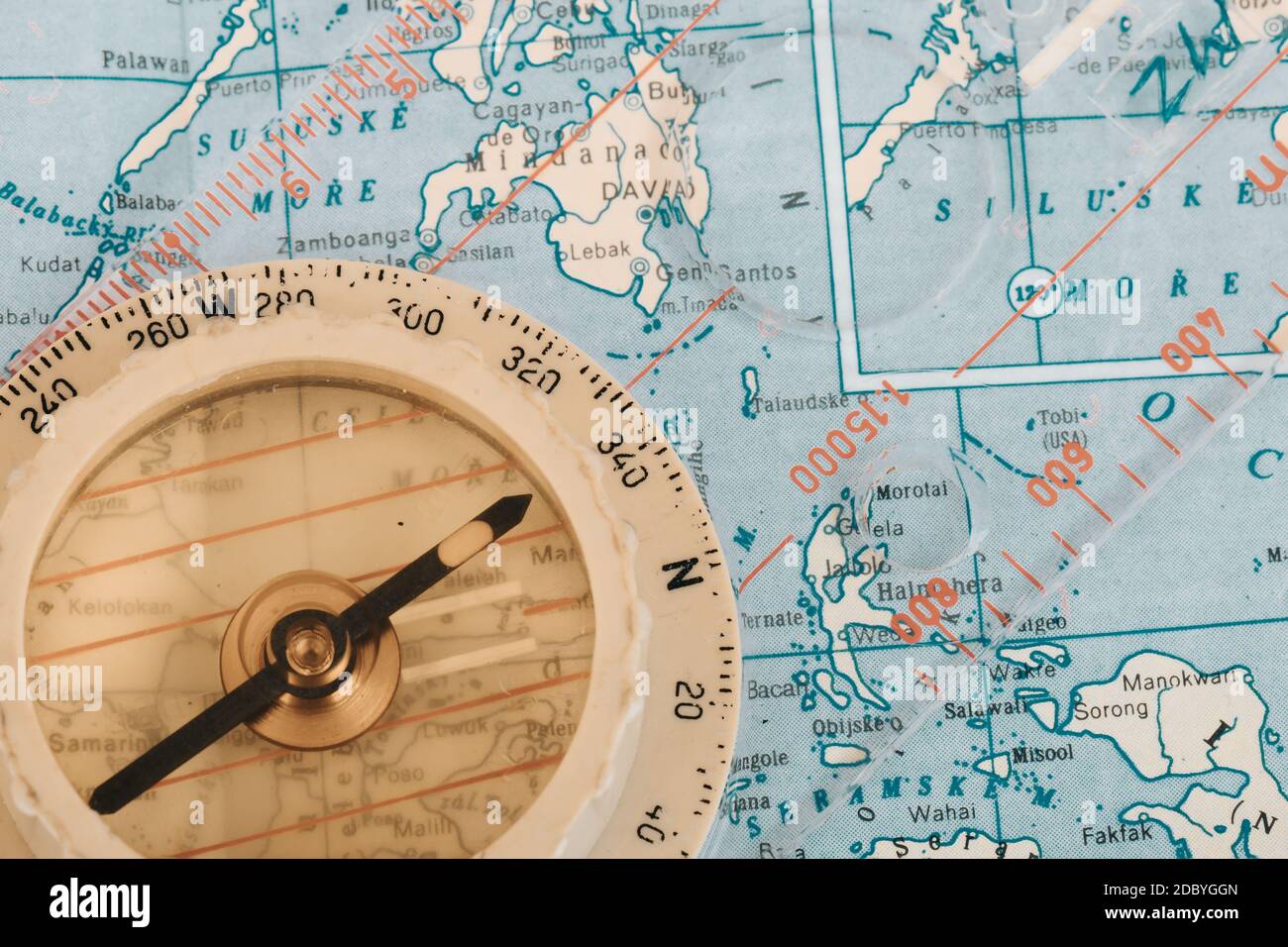 old transparent plastic sport compass with azimuth measurement on old ...