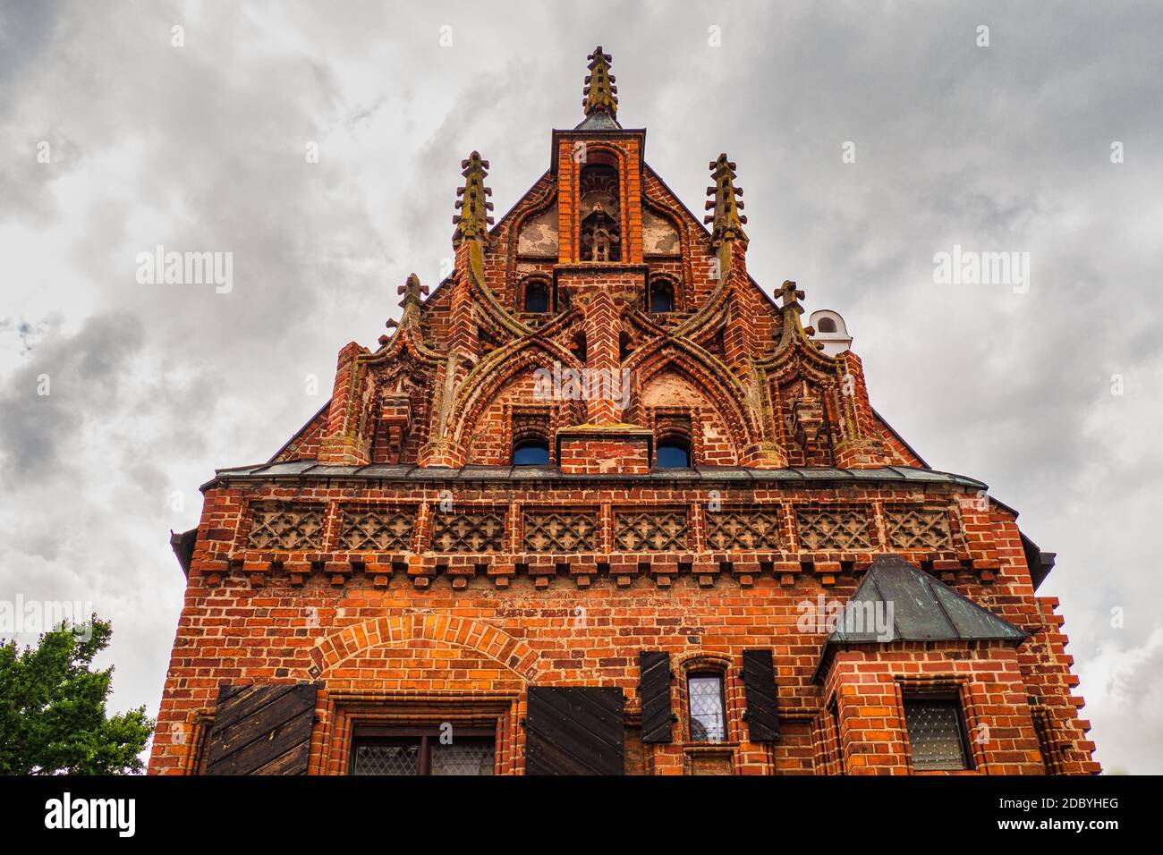The House of Perkunas in Kaunas. Gothic Architecture Stock Photo - Alamy