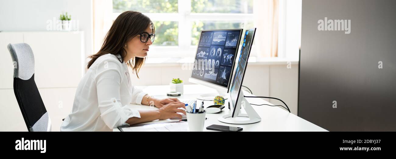 Analyst Women Looking At KPI Data On Computer Screen Stock Photo - Alamy