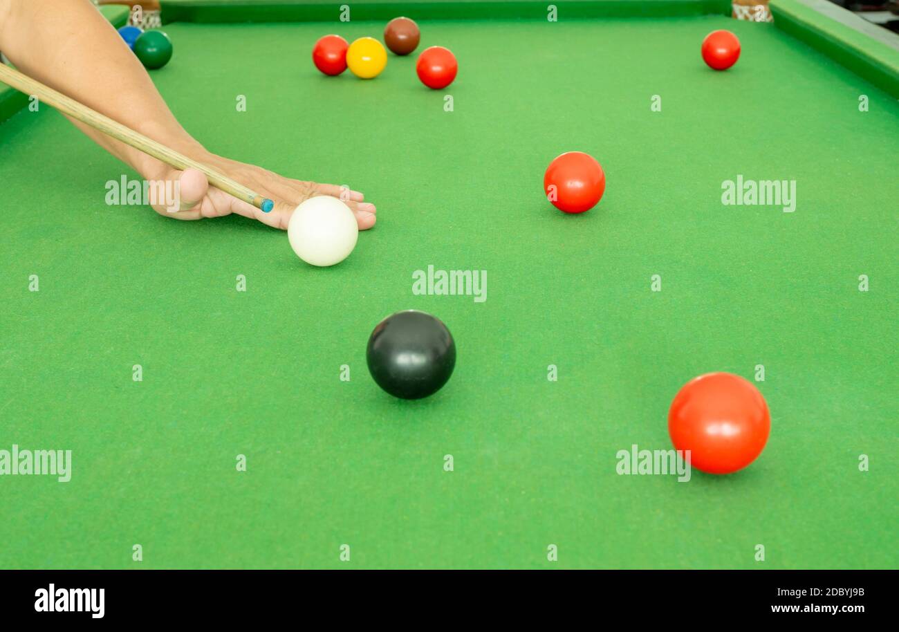 Hand people playing snooker Stock Photo - Alamy