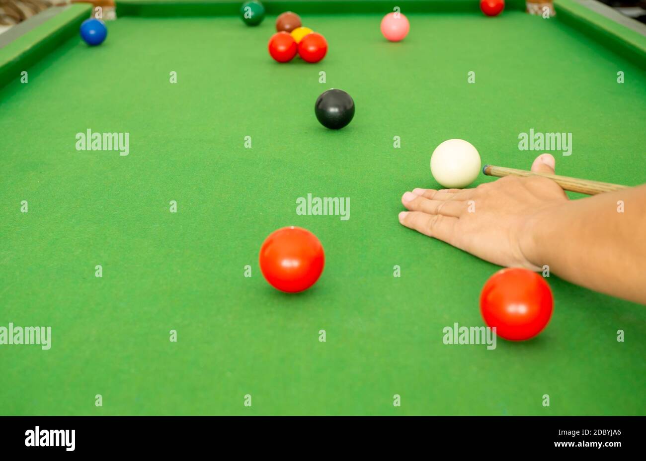 Hand people playing snooker Stock Photo - Alamy