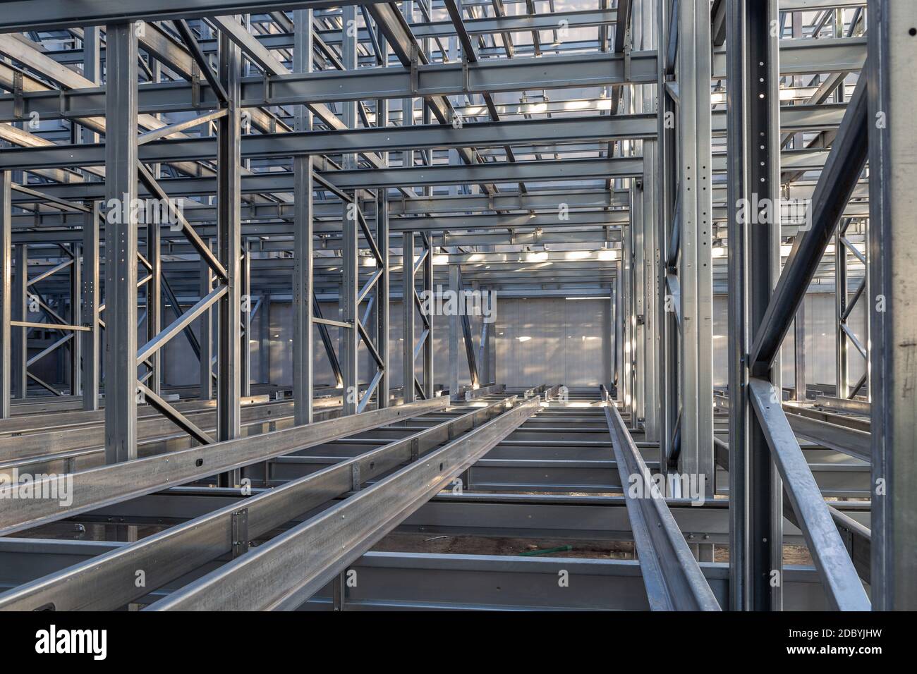 Steel structure of a high rack warehouse Stock Photo - Alamy