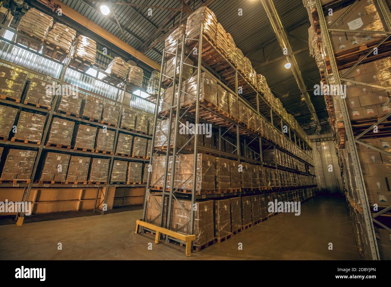 Big warehouse with many different boxes on the shelves Stock Photo - Alamy