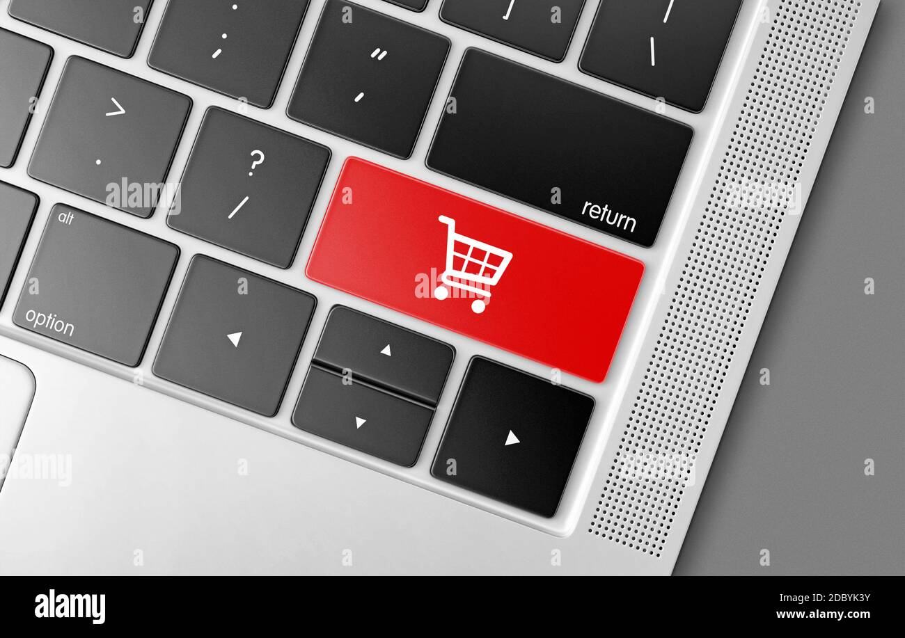 Red shopping cart key on a black computer keyboard, internet shopping ...