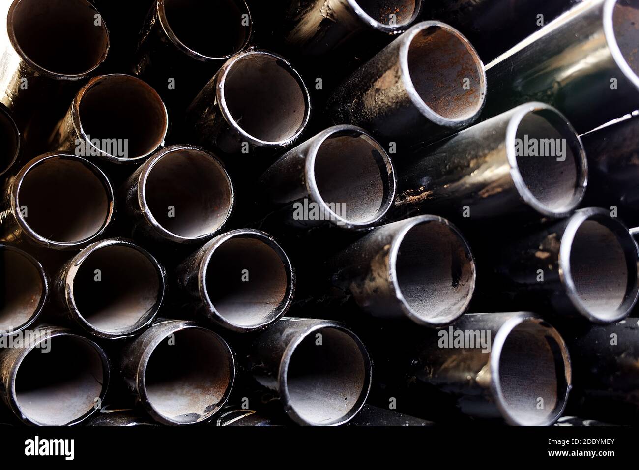 Black metal pipes and adapters of different diameters for gasification ...