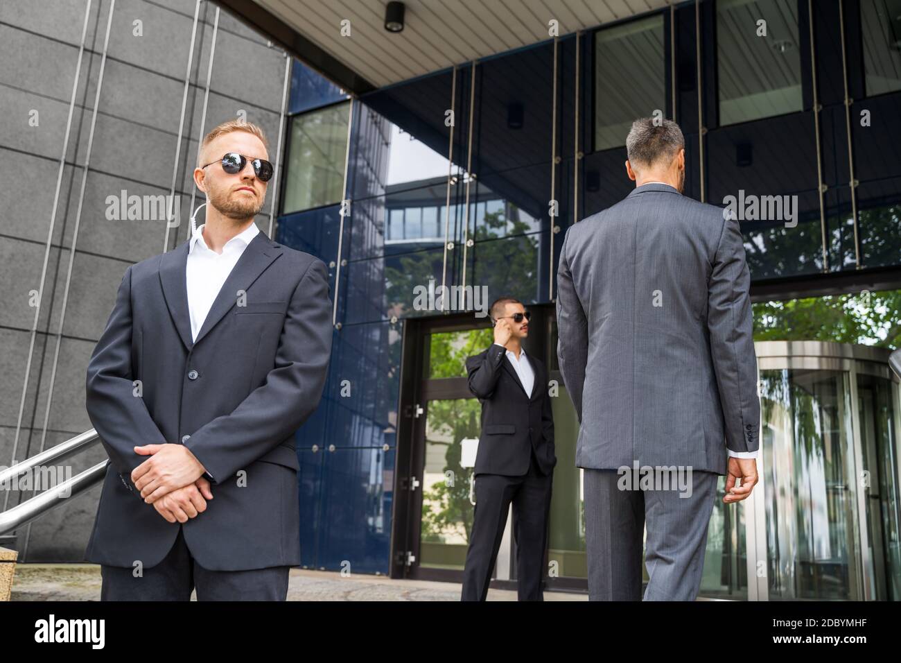 Security Guard Service Protecting Business Man Outside Stock Photo - Alamy