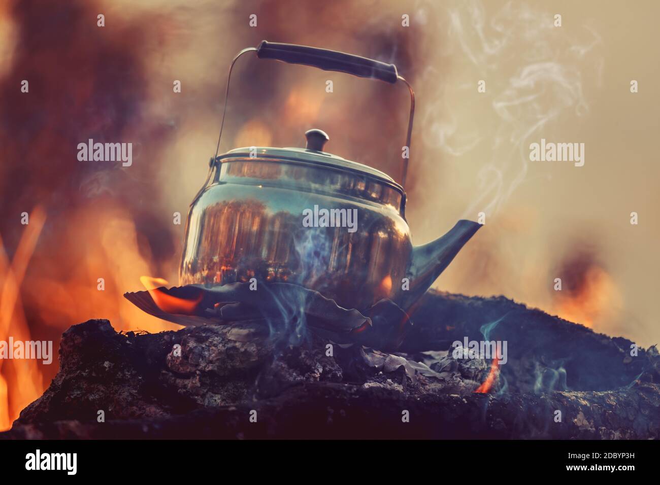 Boiling water on campfire hi-res stock photography and images - Alamy