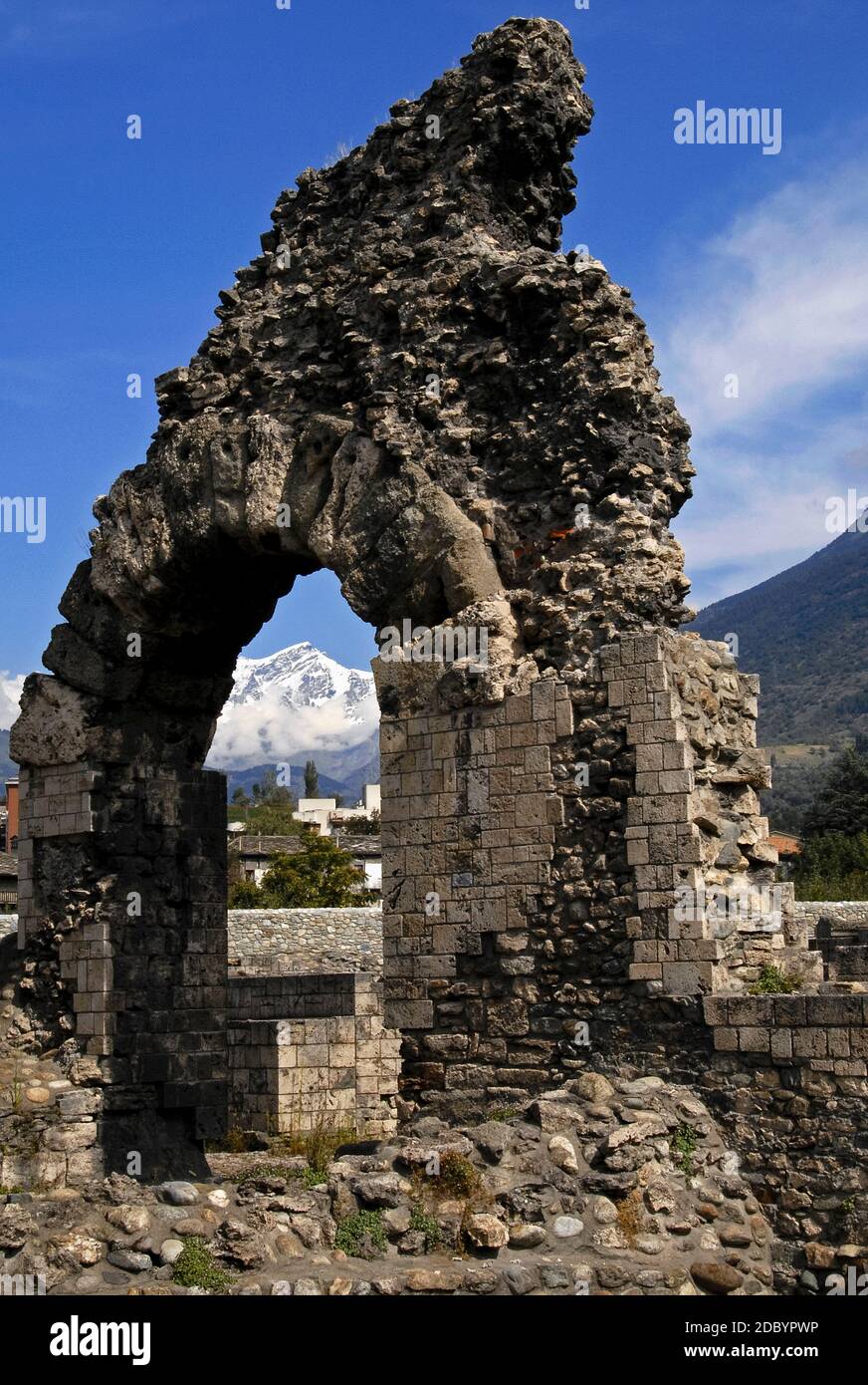 Exposed rubble core of walling above a surviving arch of the Teatro ...