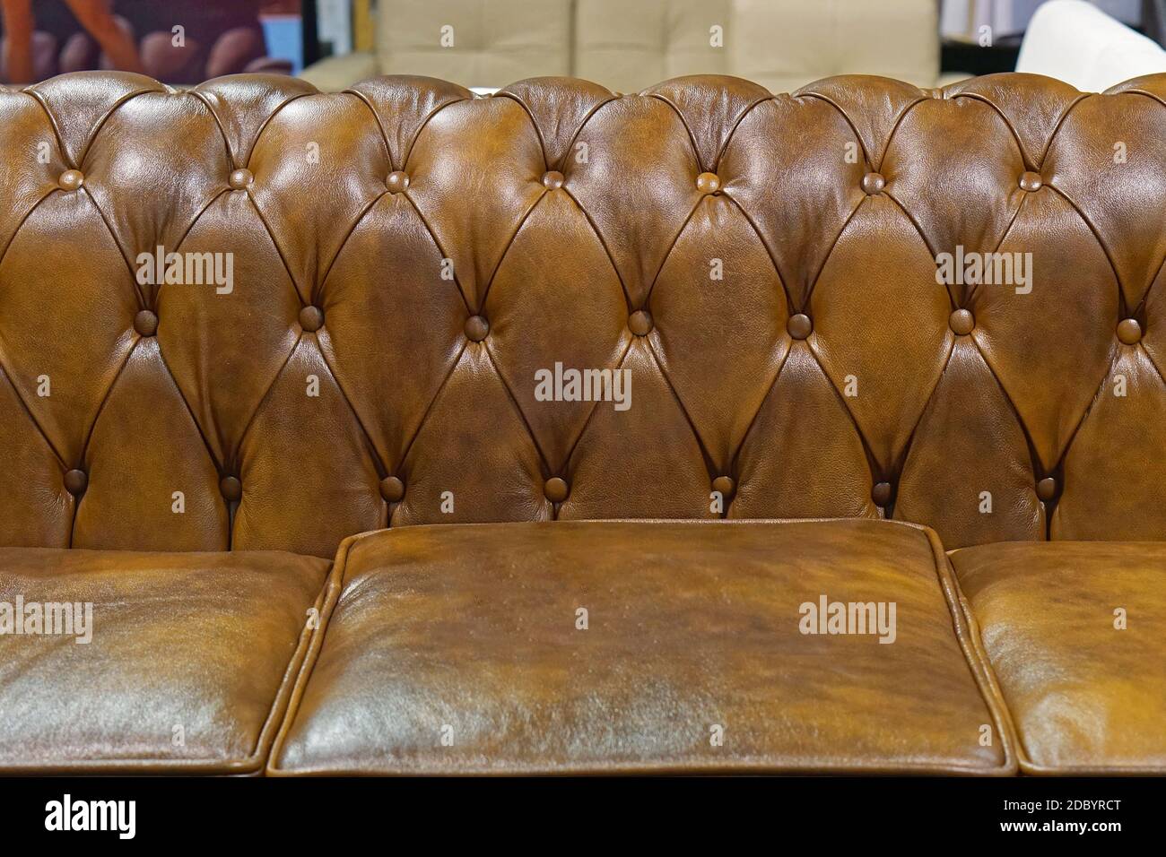 Brown leather sofa backrest upholstery pattern Stock Photo - Alamy