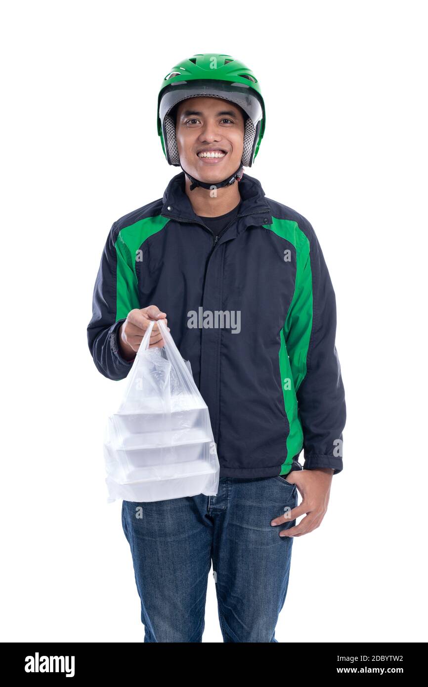 fast food delivery. man with uniform jacket and helmet delivering food ...