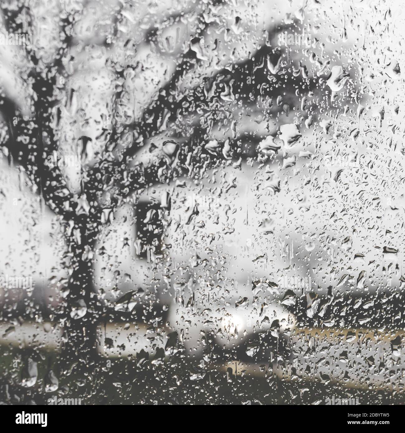 Bad weather driving on a way. Poor view caused by heavy rain and spray ...