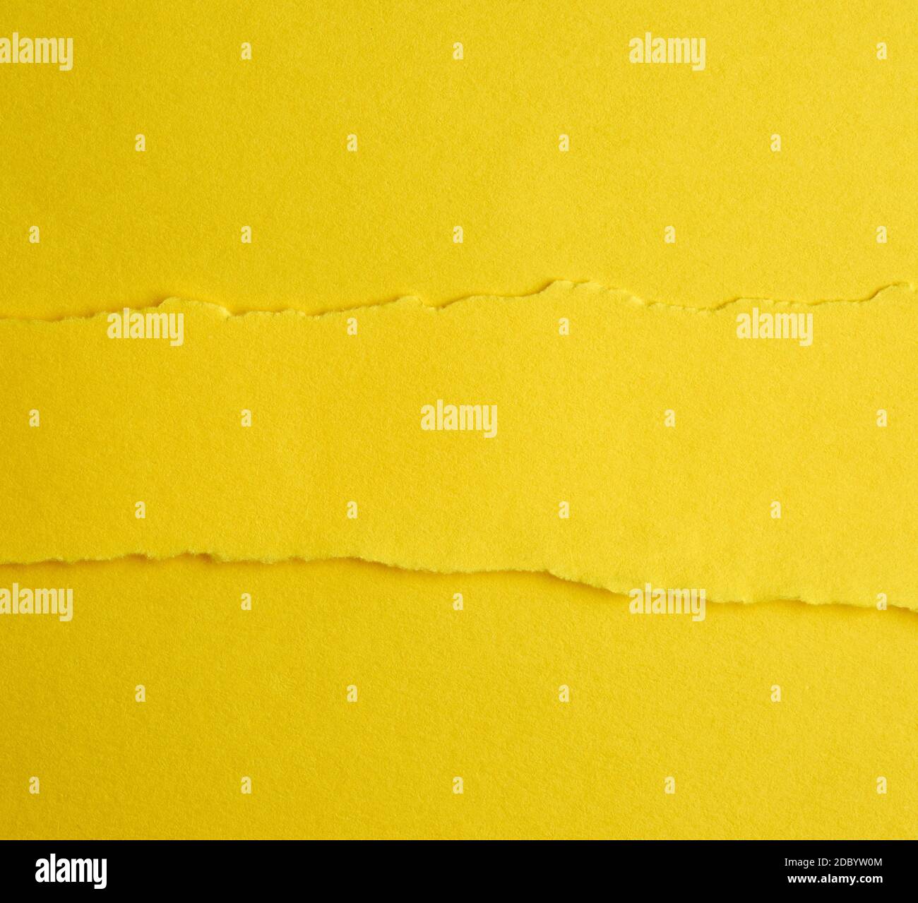 background of layered yellow torn paper with a shadow, backdrop and ...