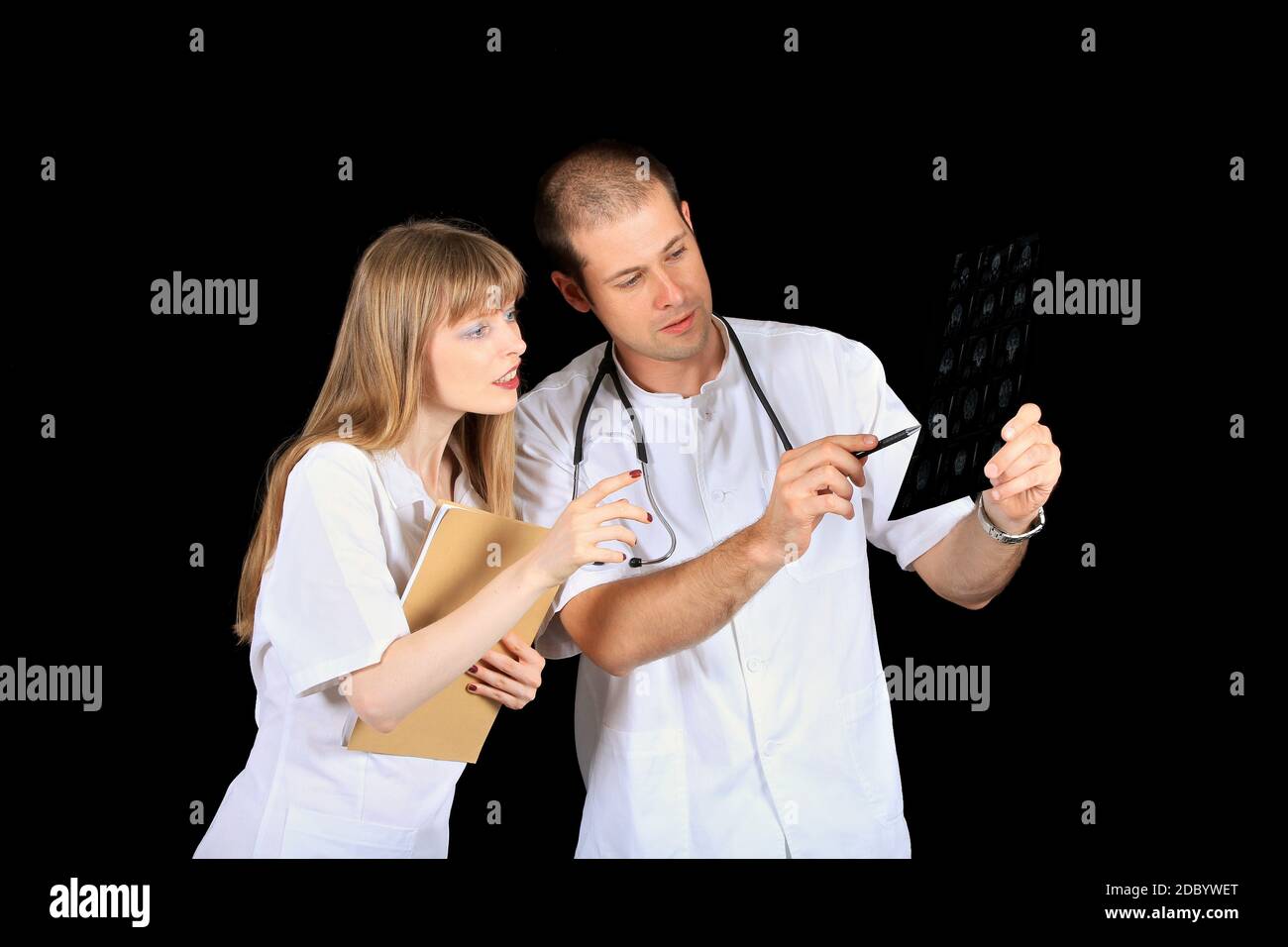 Medical workers commenting on patientÕs MRI scan Stock Photo - Alamy