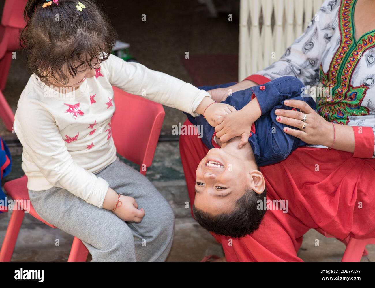 Tickling boy hi-res stock photography and images - Alamy
