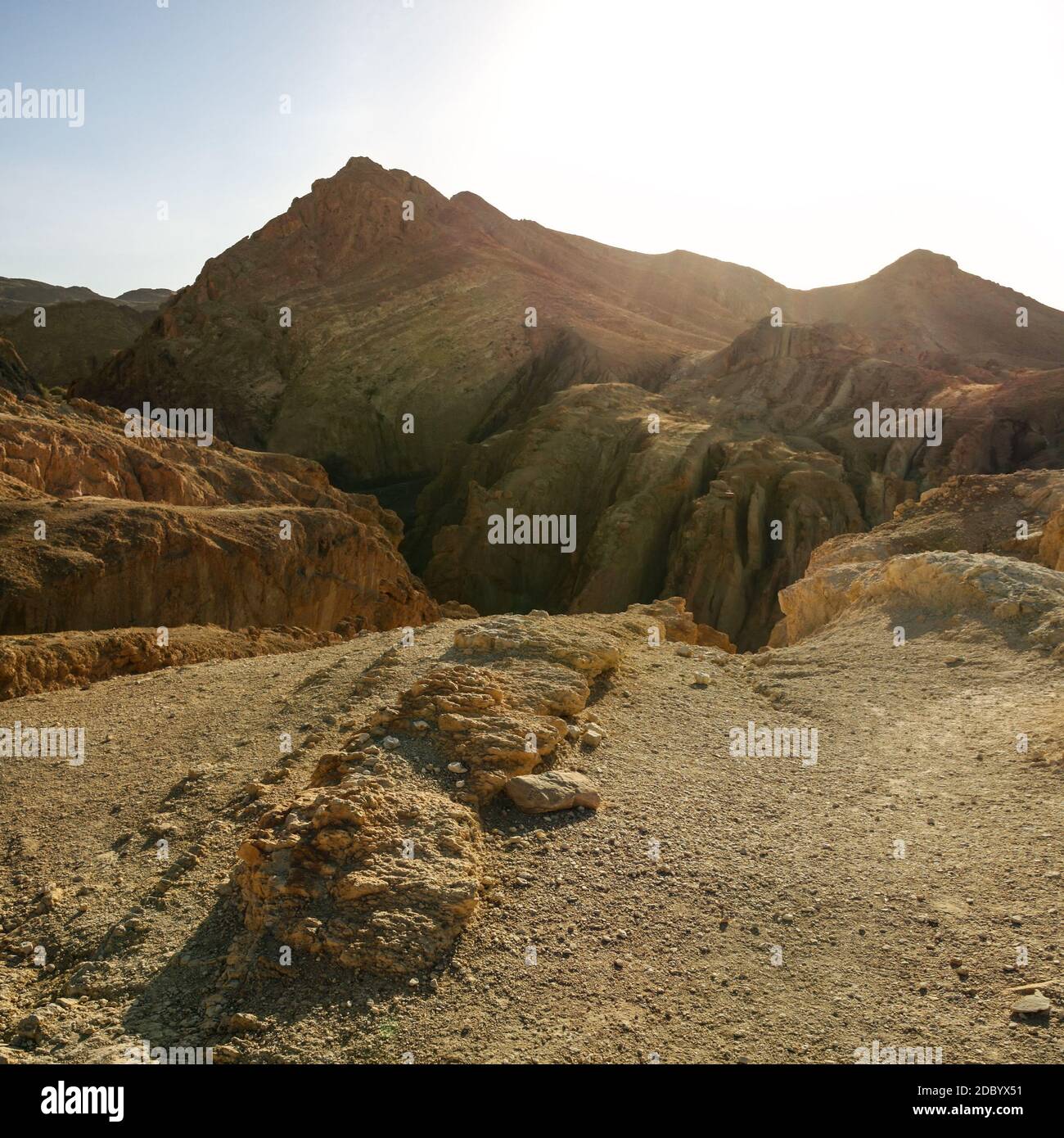 Atlas mountains near Chebika in strong sun back light Stock Photo - Alamy