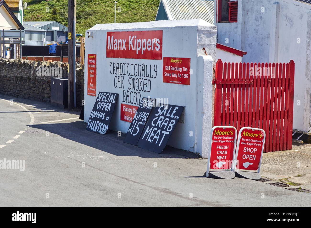 Signs outside Moore’s kipper factory and shop in Peel, Isle of Man ...