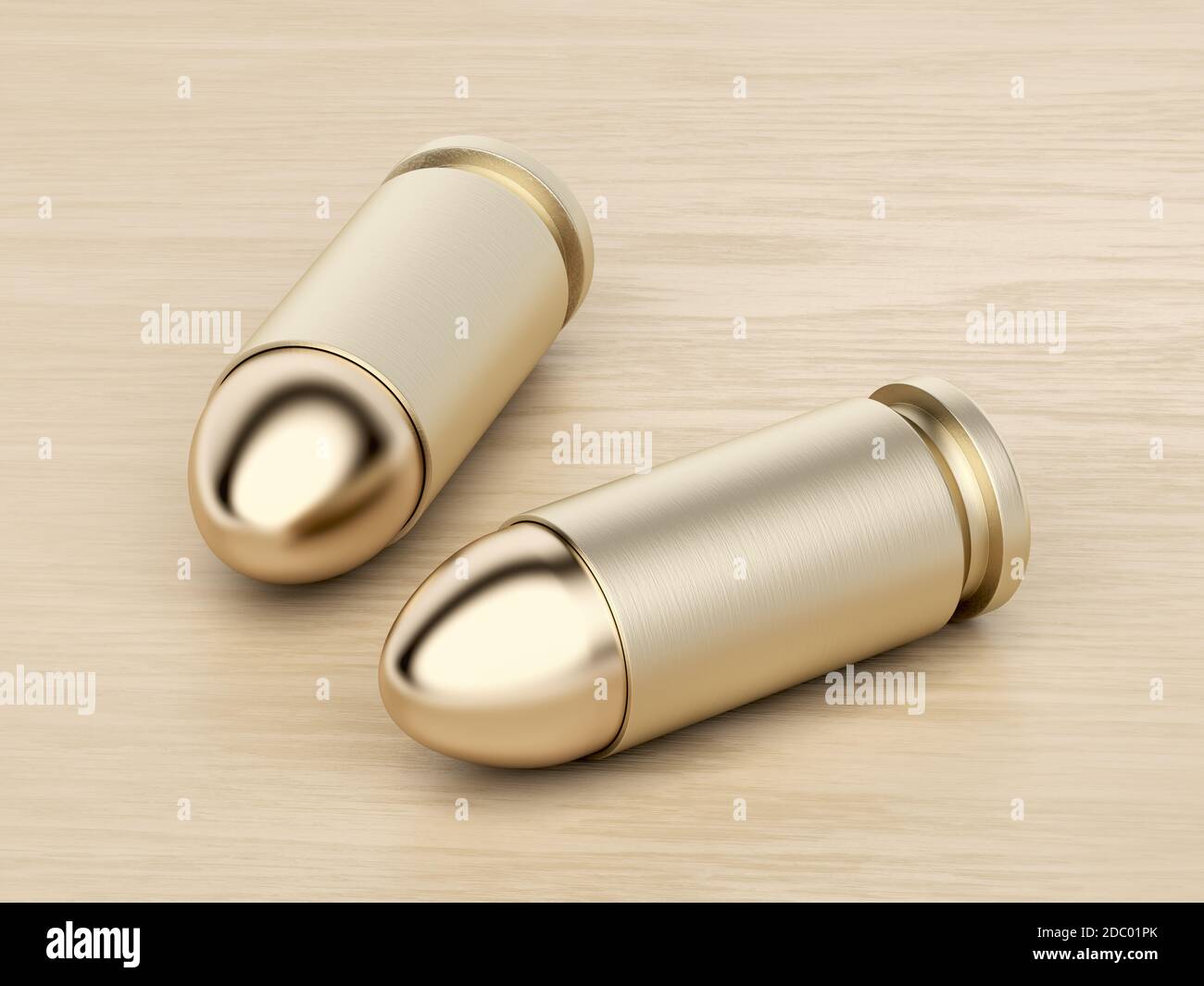 Two pistol bullets on the wooden desk Stock Photo - Alamy