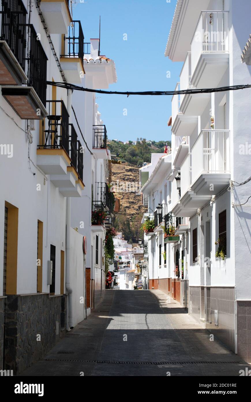 View along a village street, Torrox, Malaga Province, Andalucia, Spain ...