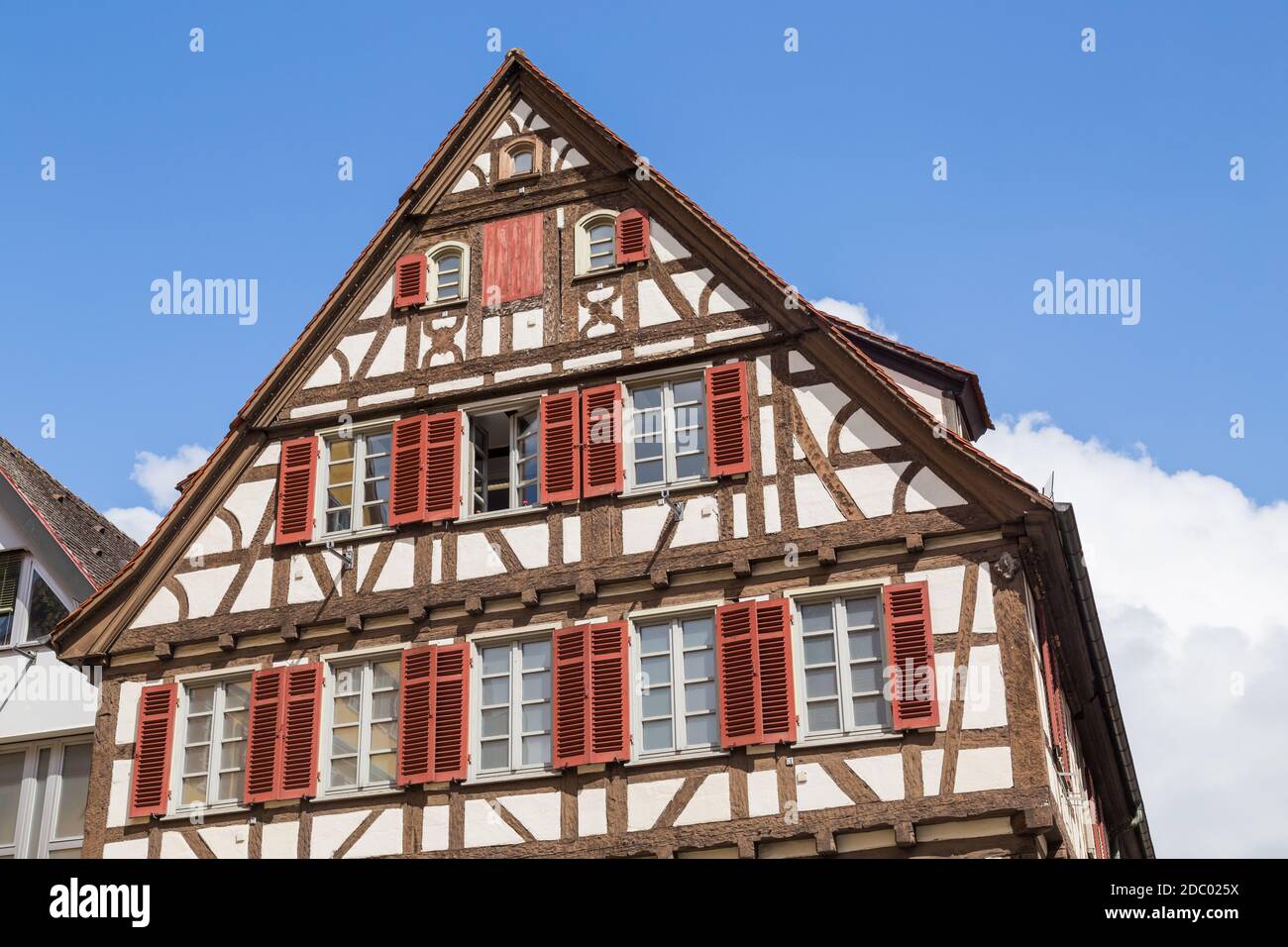 historic half-timbered building made of dark wood with balconies and ...