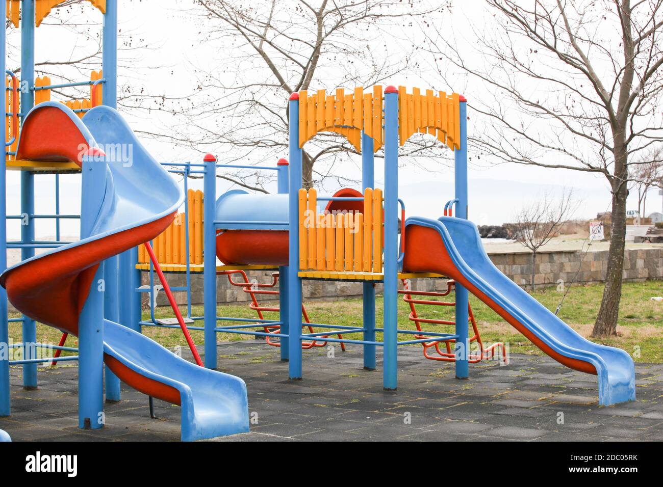 Colorful children playground in the city park Stock Photo - Alamy