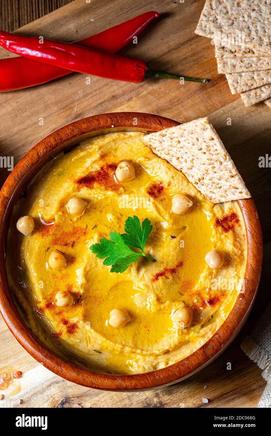Delicious hummus paste with lemon and chilli Stock Photo - Alamy